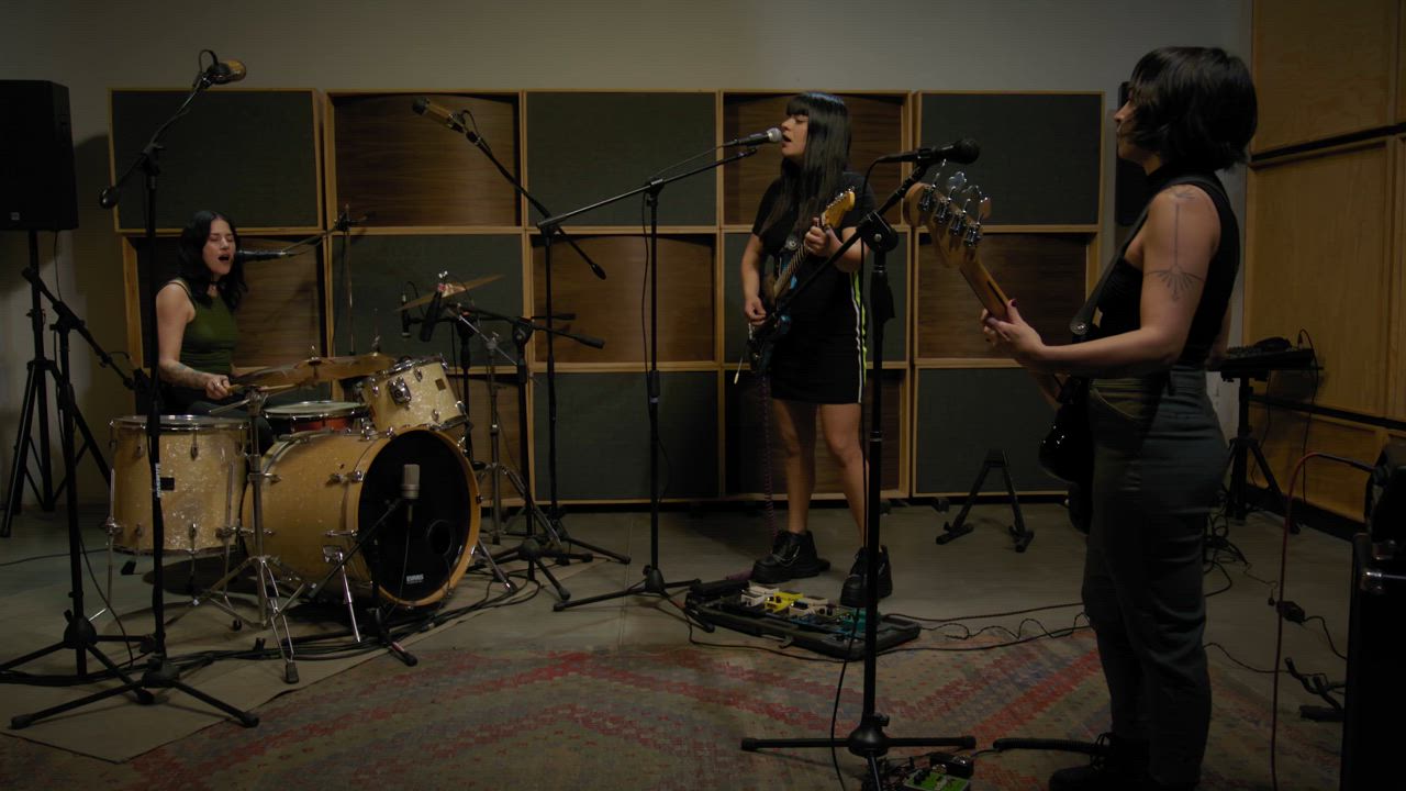 Rock group of three women playing in a studio - Free Stock Video