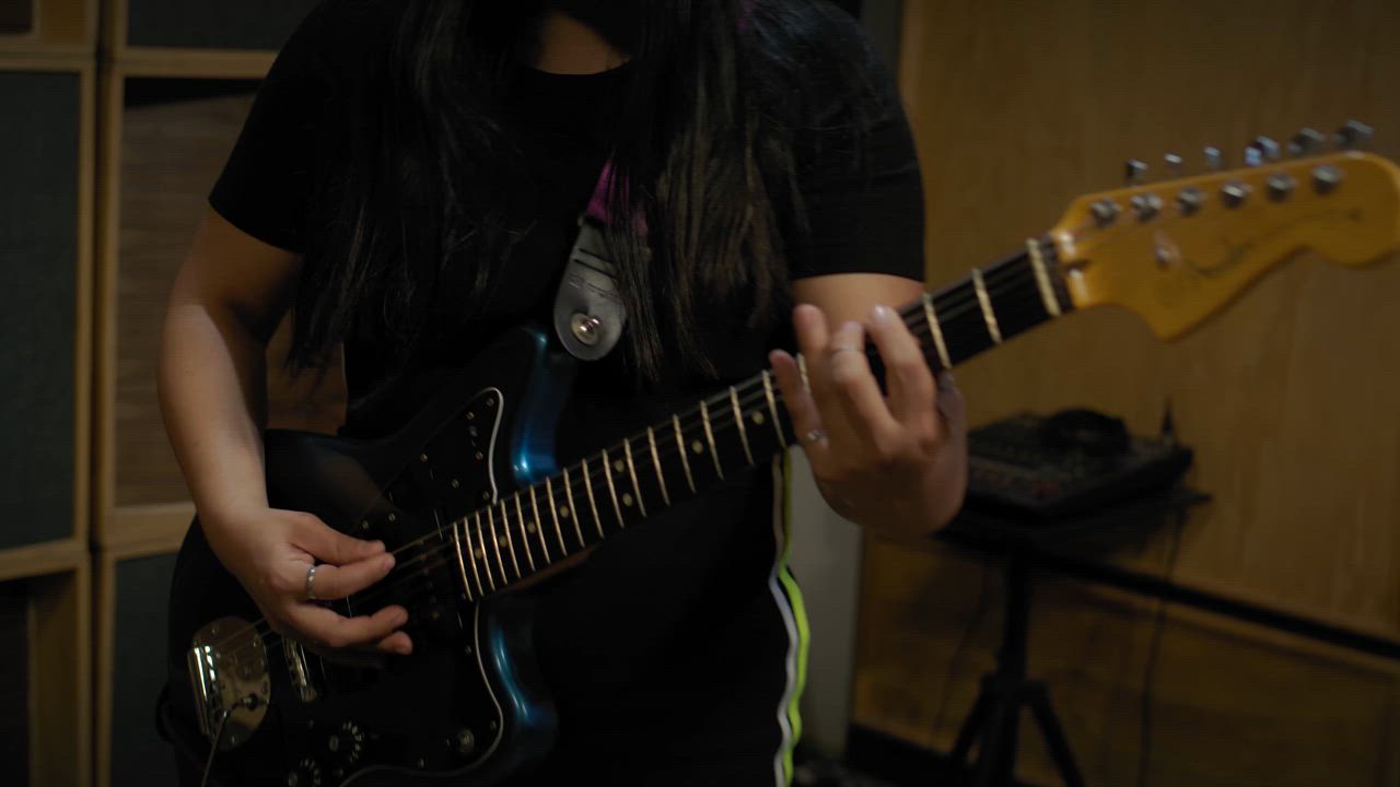 Close shot of two members of a female band playing - Free Stock Video
