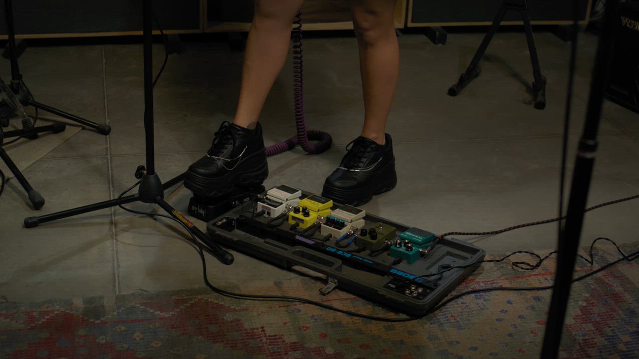 Close shots of a girl band playing in a studio - Free Stock Video