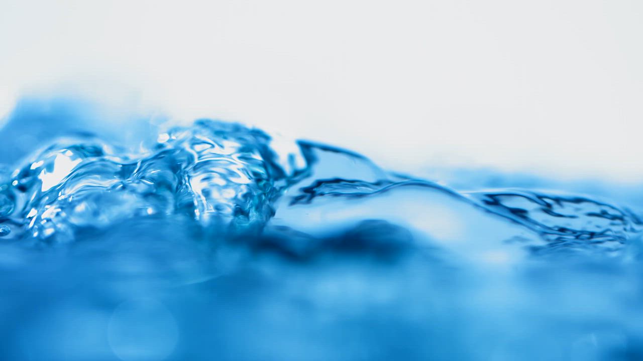 Intensely bubbling water surface in slow motion - Free Stock Video