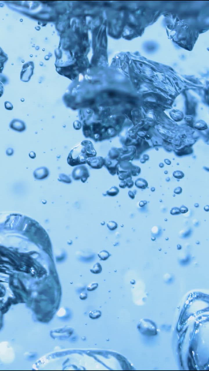 Chaotic bubbles in water rising in slow motion - Free Stock Video