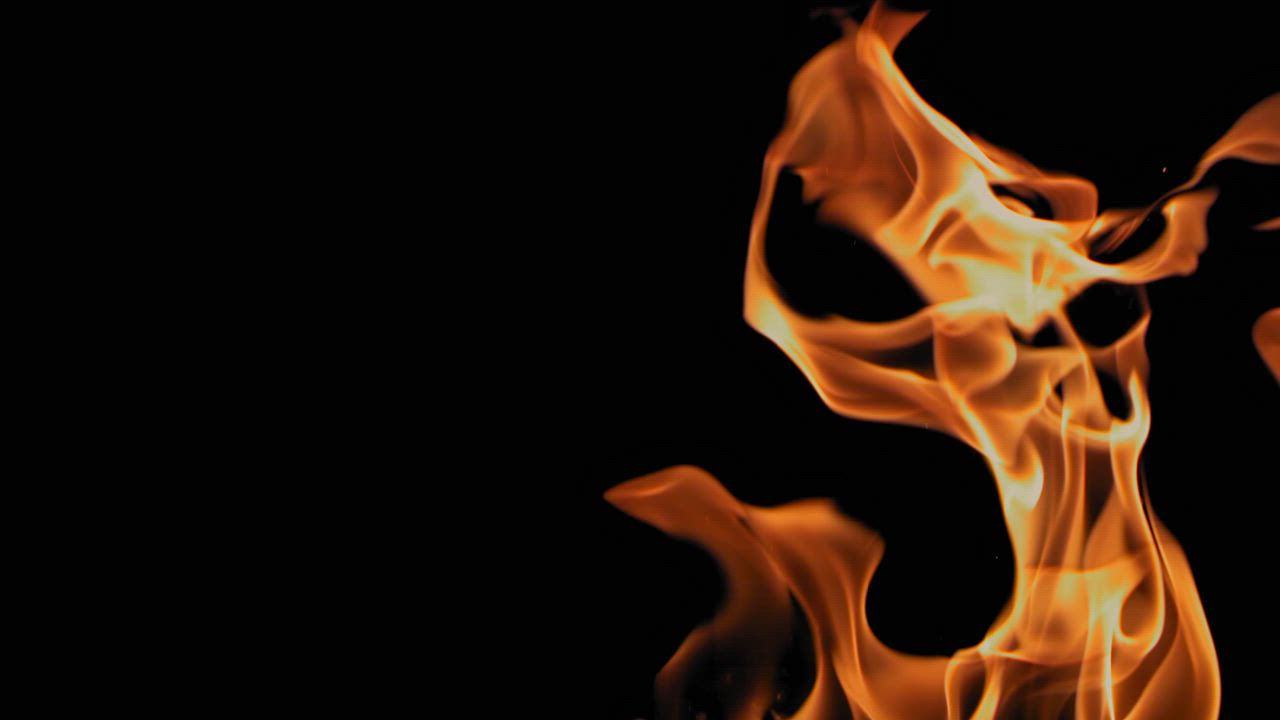 Blazing flames flowing in slow motion over a black background - Free ...