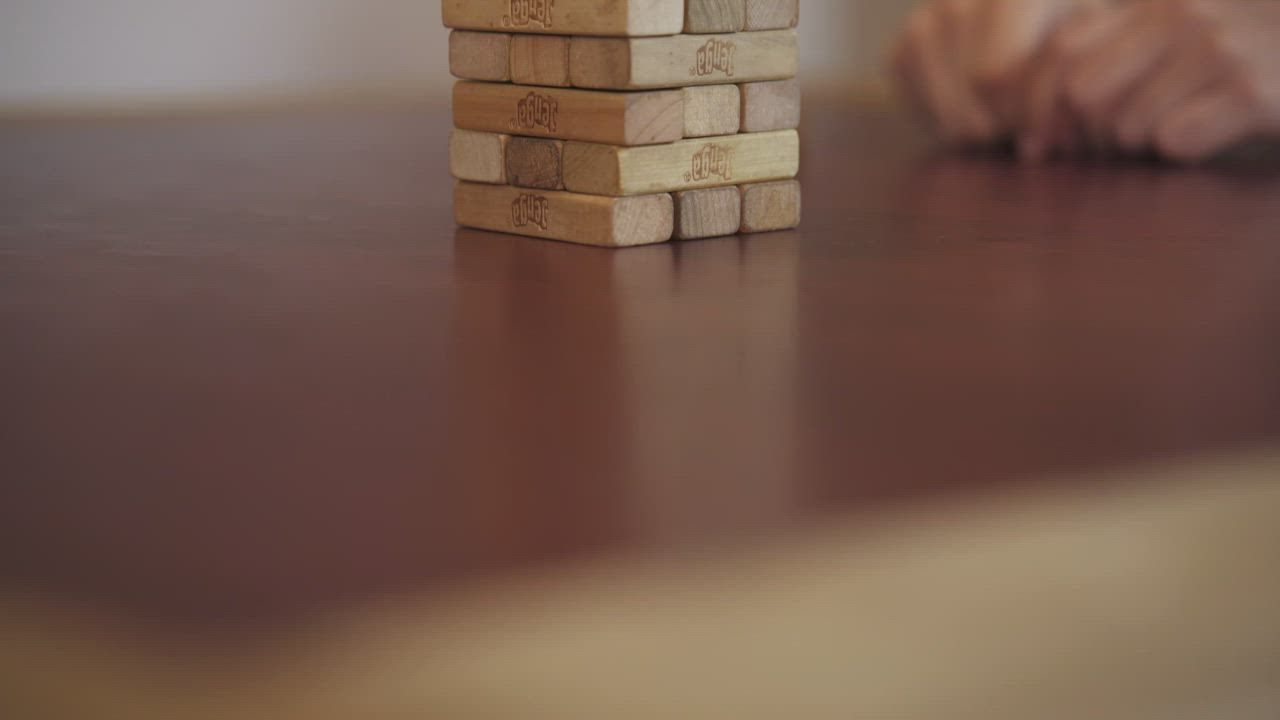 Jenga tower on a table seen in detail - Free Stock Video