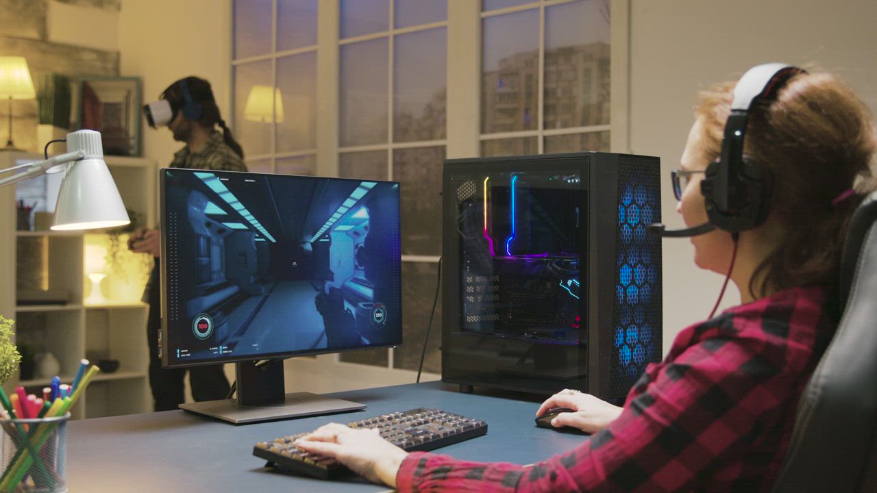 Young couple enjoy video gaming together at home - Free Stock Video