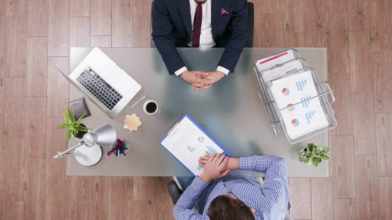 Top view of business handshake and client meeting - Free Stock Video