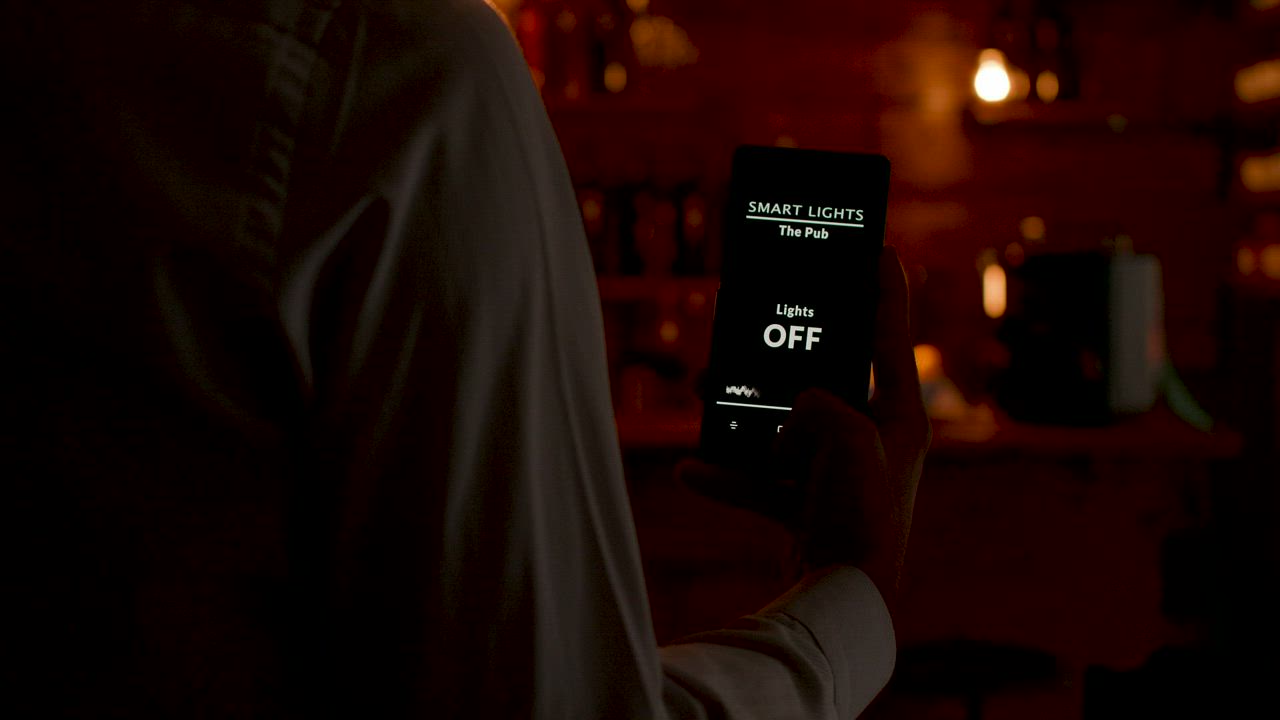Innovative smart home app turns lights on and off - Free Stock Video