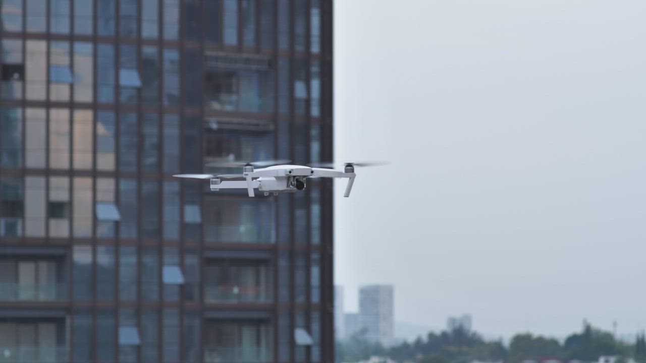 Drone in the sky at a city - Free Stock Video
