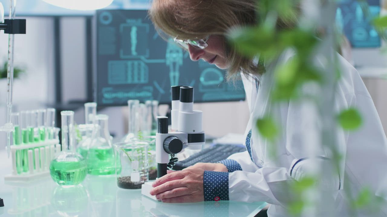 Bio Chemist working in her lab - Free Stock Video