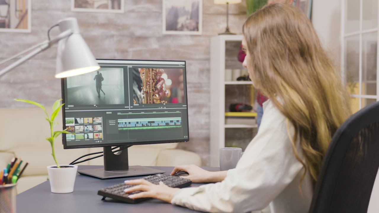 Woman editing a video - Free Stock Video