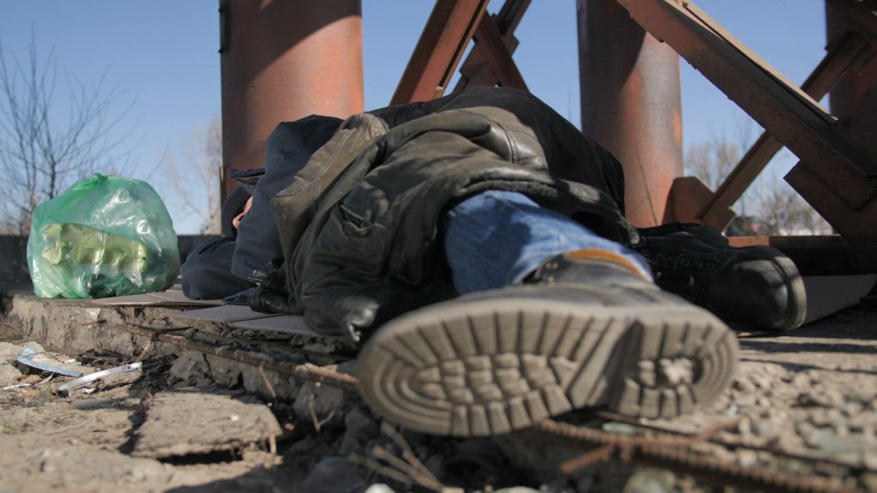 Homeless man laying down - Free Stock Video