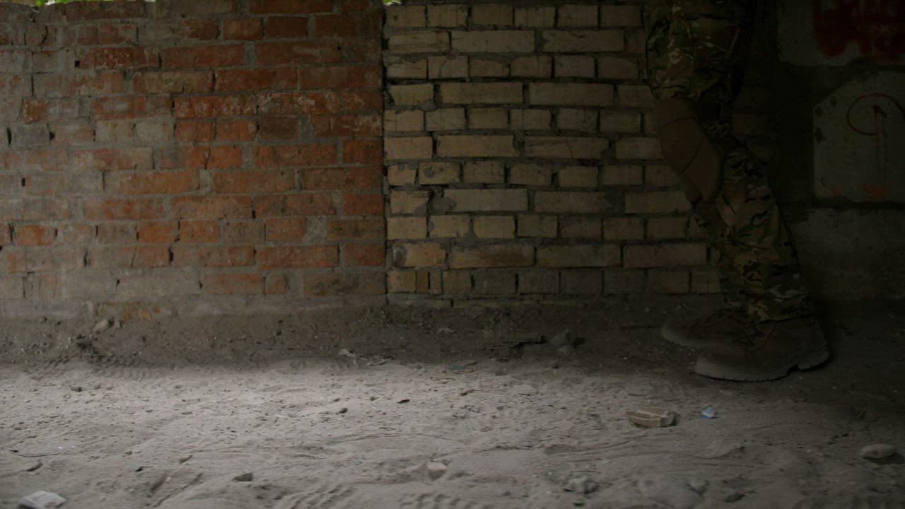Elite soldiers running through a building - Free Stock Video