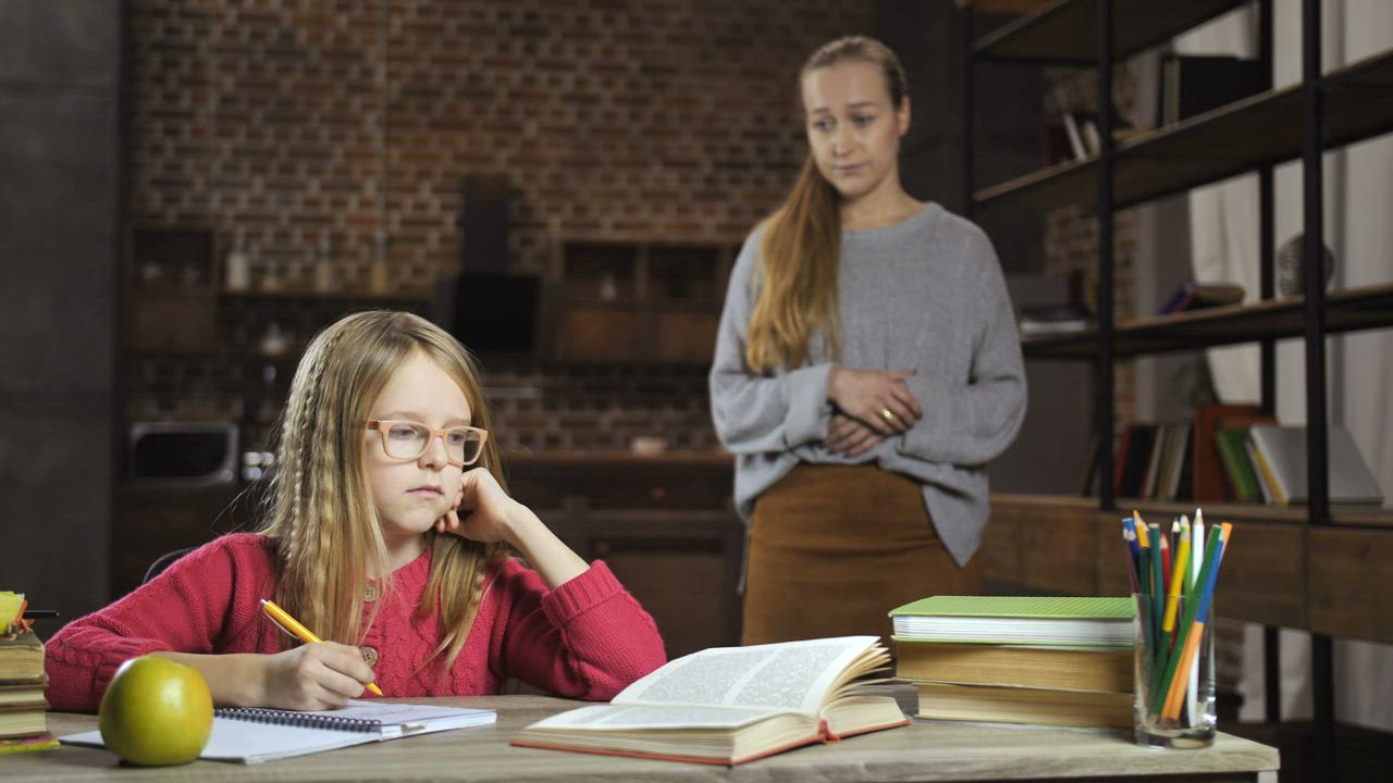 Mother talking to her daughter about school - Free Stock Video