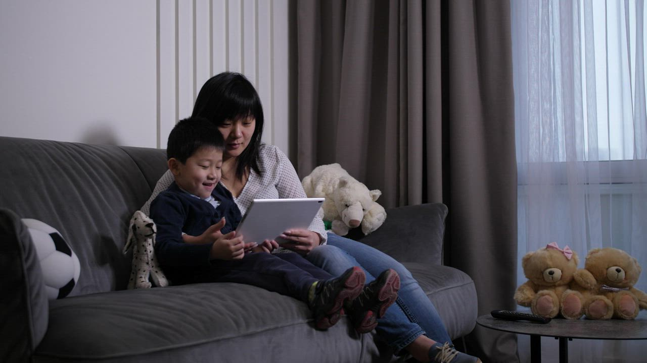 Mother and son using a tablet - Free Stock Video