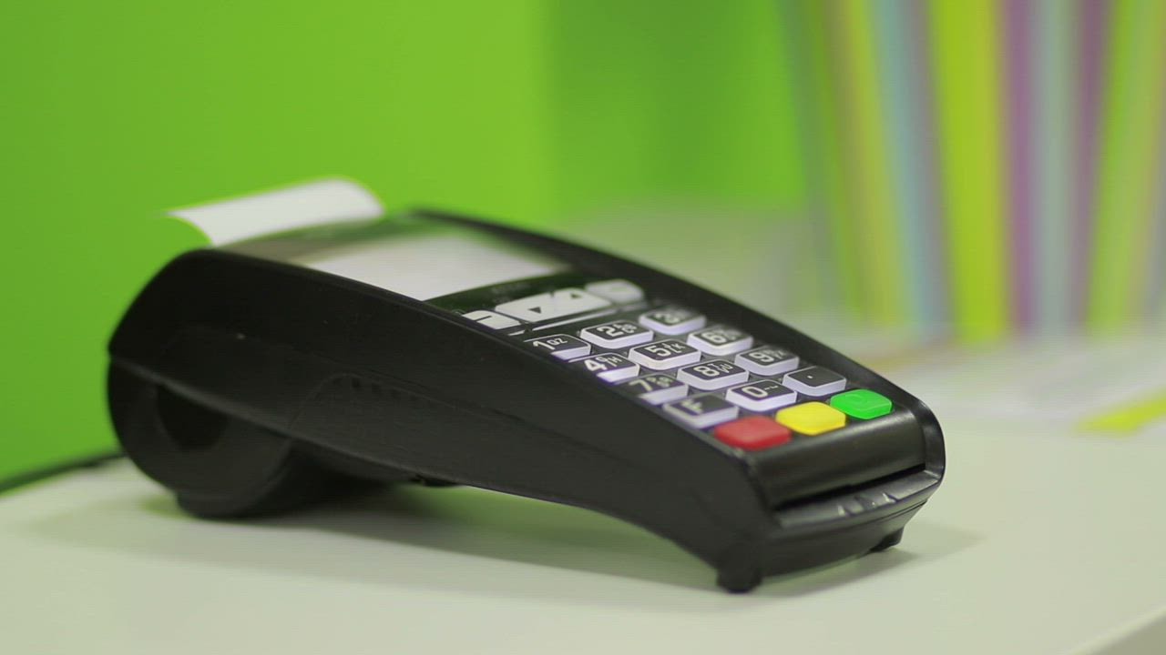 Using a bank terminal during a card payment - Free Stock Video