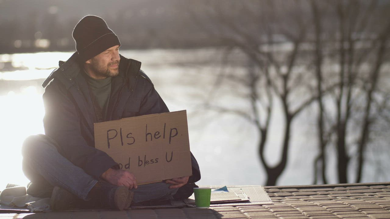 Homeless man given money - Free Stock Video