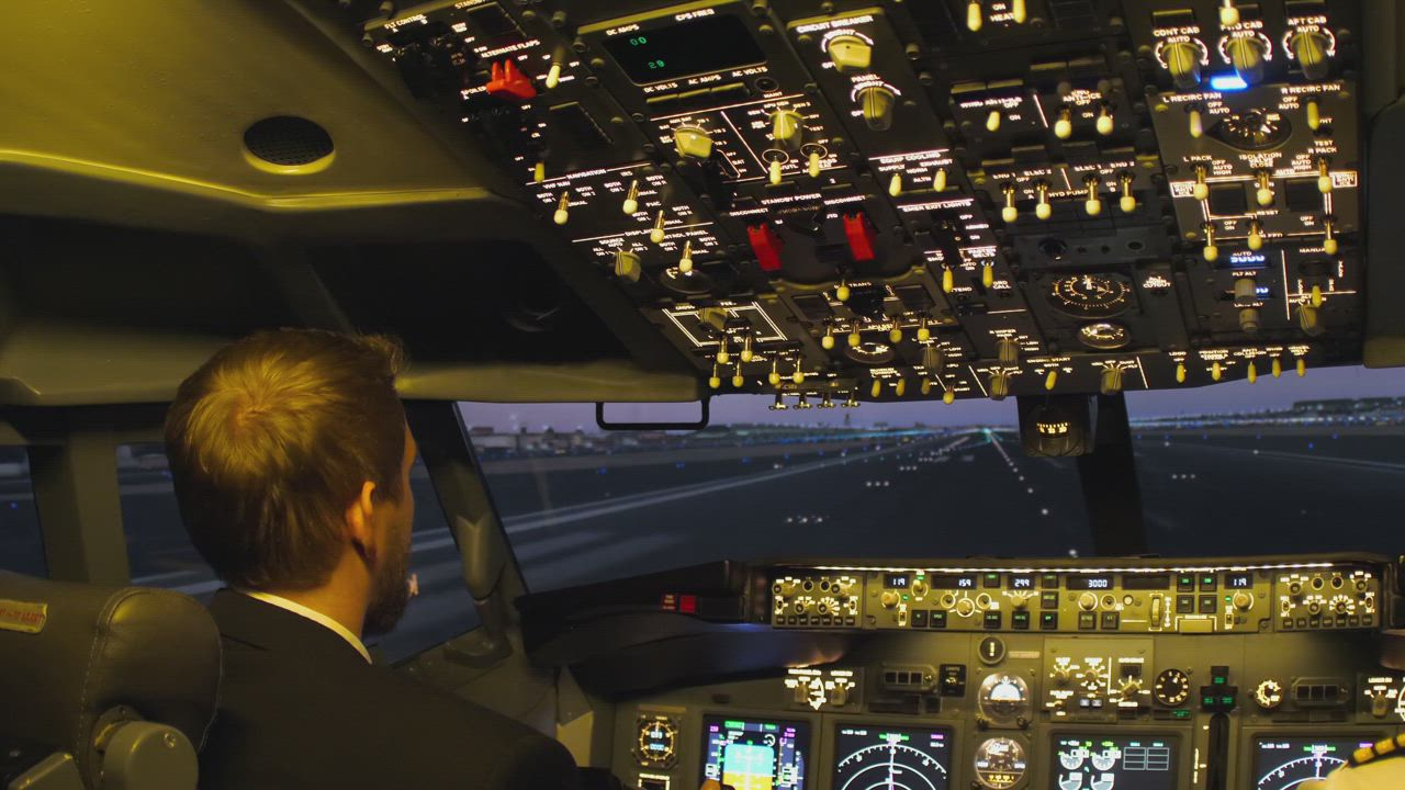 Cockpit view of pilot landing commercial plane - Free Stock Video