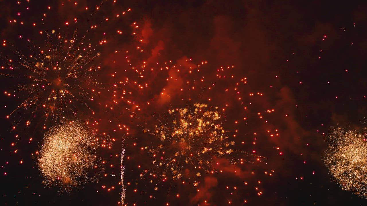 Red fireworks at city day festival - Free Stock Video