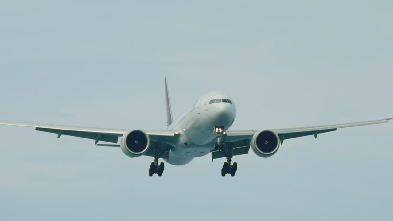 Airplane preparing to land - Free Stock Video