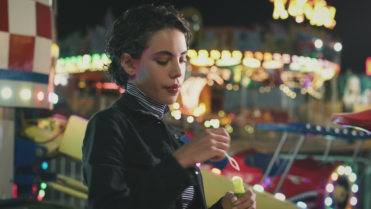 Young woman at the fair - Free Stock Video