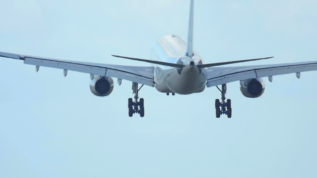 Airplane landing in slow motion, back view - Free Stock Video