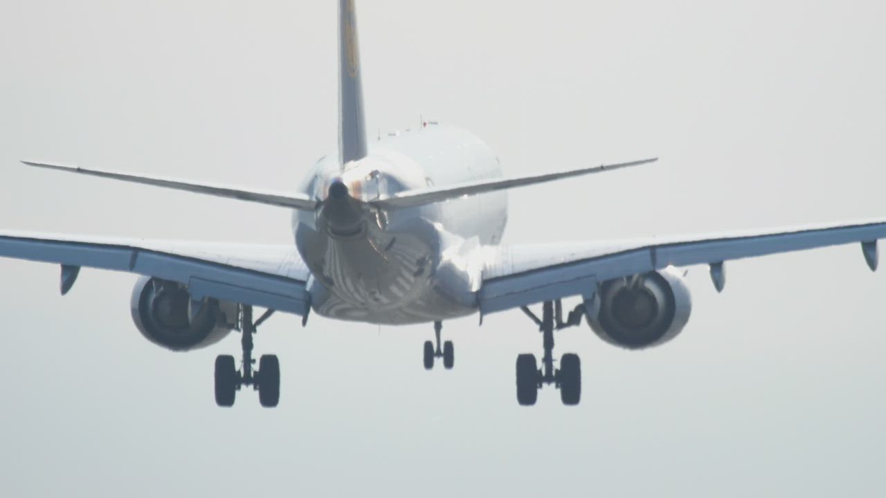 Airplane landing rear view - Free Stock Video