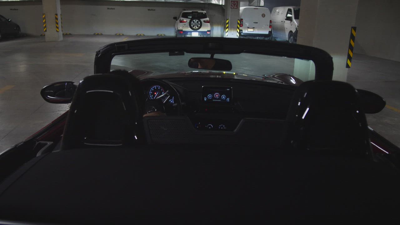 Convertible sports car parking - Free Stock Video