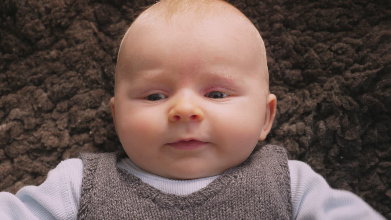 Baby smiling at the camera - Free Stock Video
