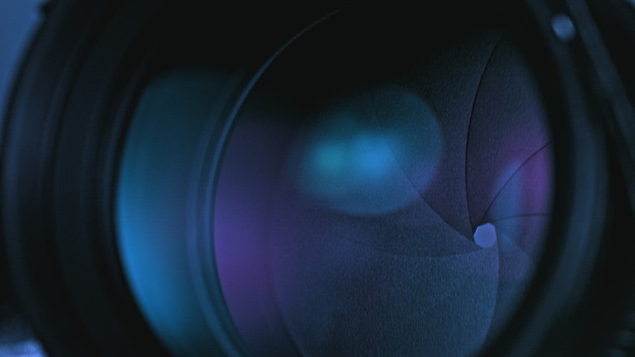 Camera lens opening up - Free Stock Video