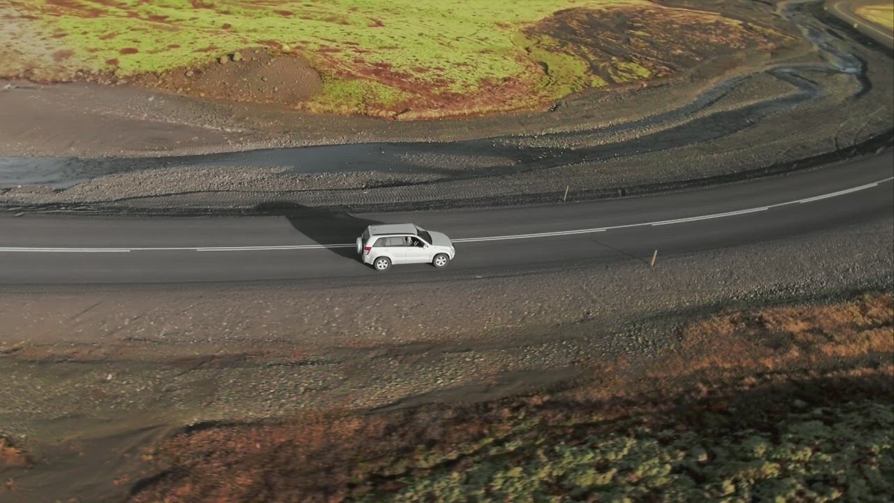 Car driving slowly - Free Stock Video