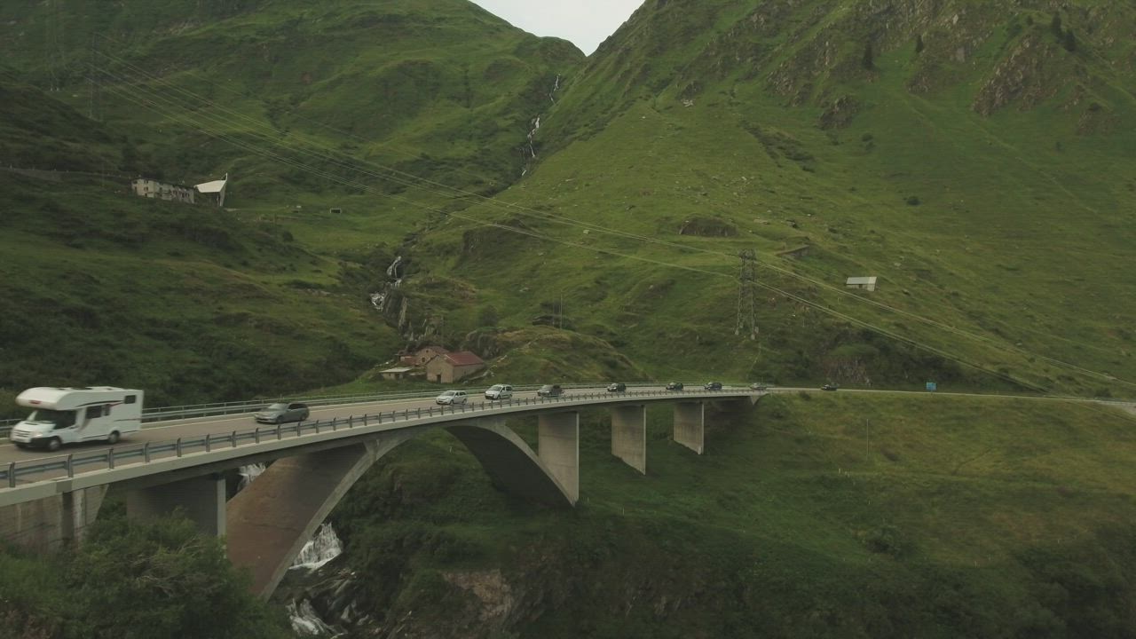 Cars driving over a bridge - Free Stock Video