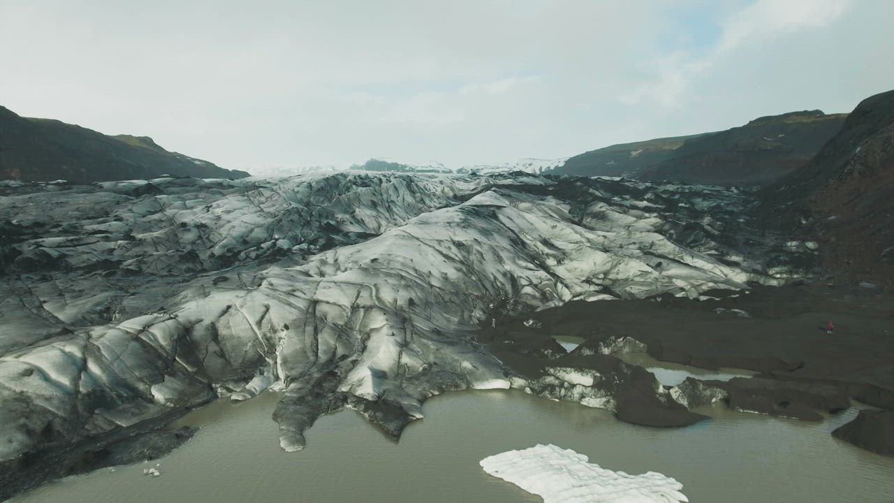 Flying over a glacier field - Free Stock Video