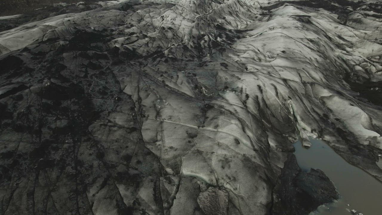 Dark ice melting - Free Stock Video