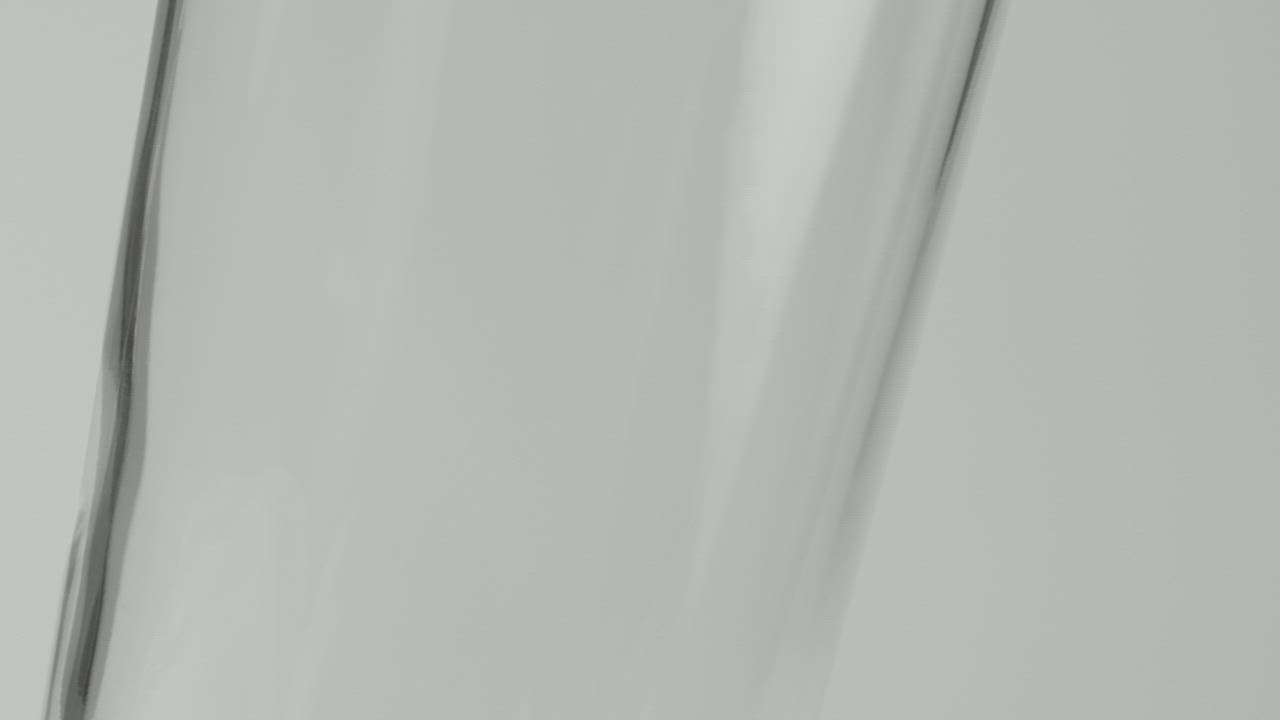 Pouring water over the edge - Free Stock Video