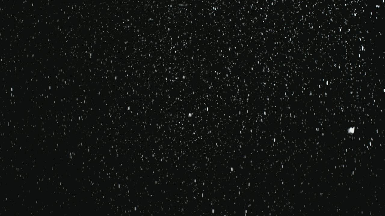 Bright snow falling - Free Stock Video