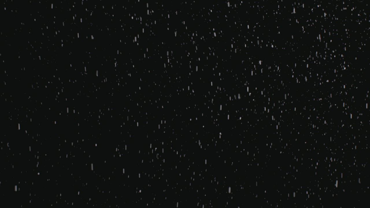 Heavy snow falling in the dark - Free Stock Video