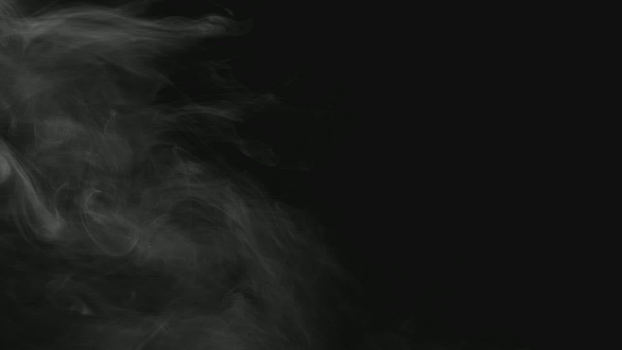 Thin smoke drifting in the dark - Free Stock Video