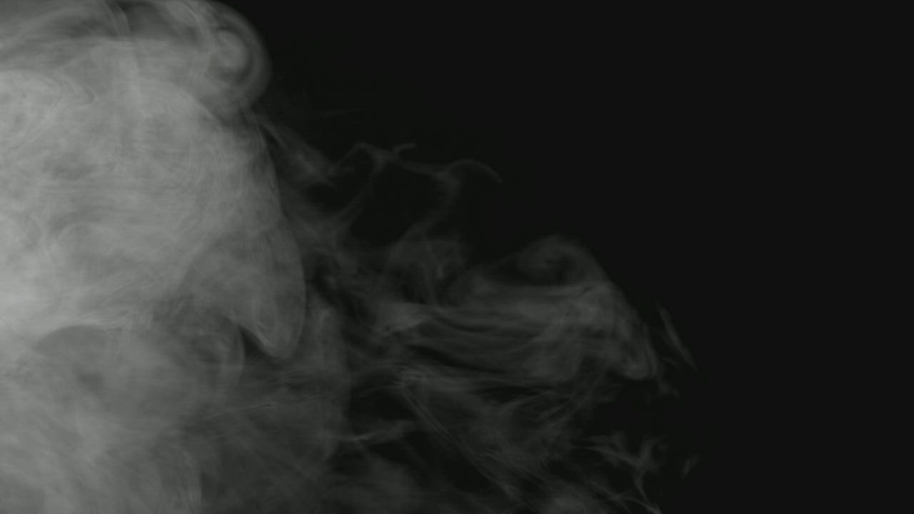 Smoke shapes moving in the dark - Free Stock Video