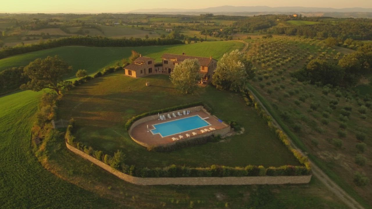 Country house with pool at sunset - Free Stock Video