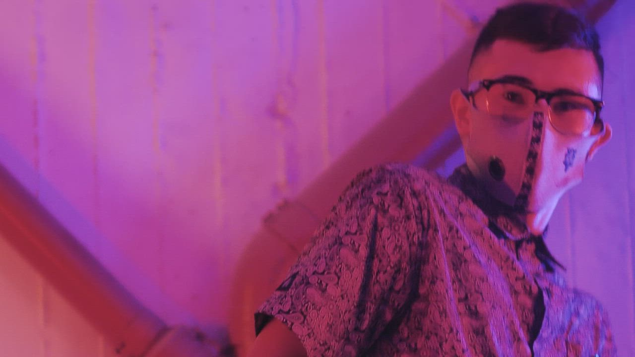 Boy and girl with face masks dancing briskly - Free Stock Video