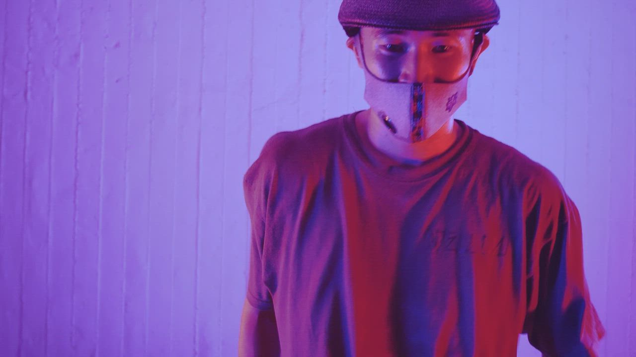 Young man with face mask dancing, portrait - Free Stock Video