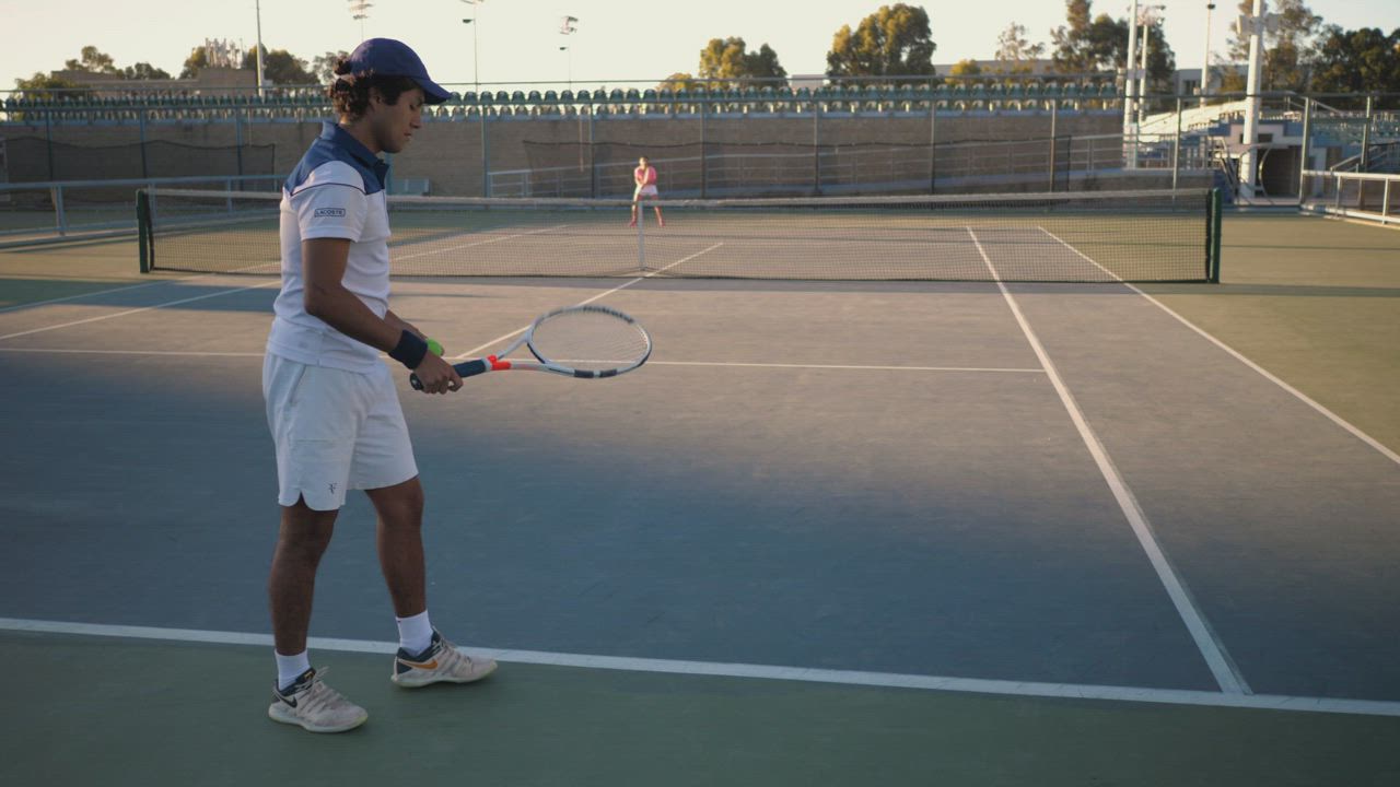 Tennis players at an outdoor court - Free Stock Video