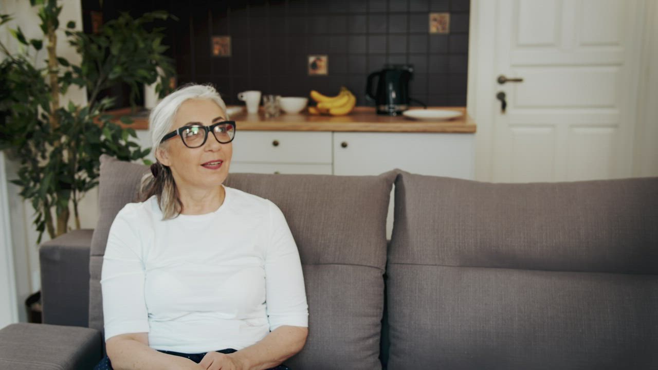Woman gives thank you hug to elderly mother - Free Stock Video