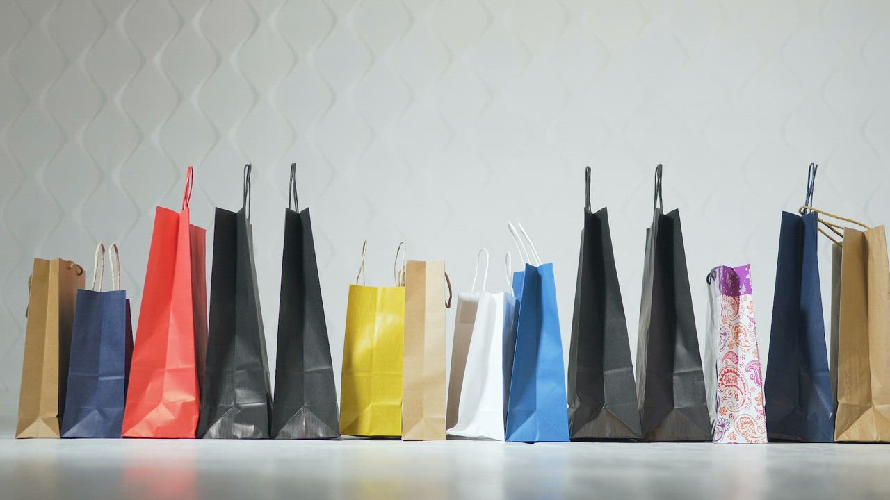 Fashionable women pick up shopping bags on white background - Free ...