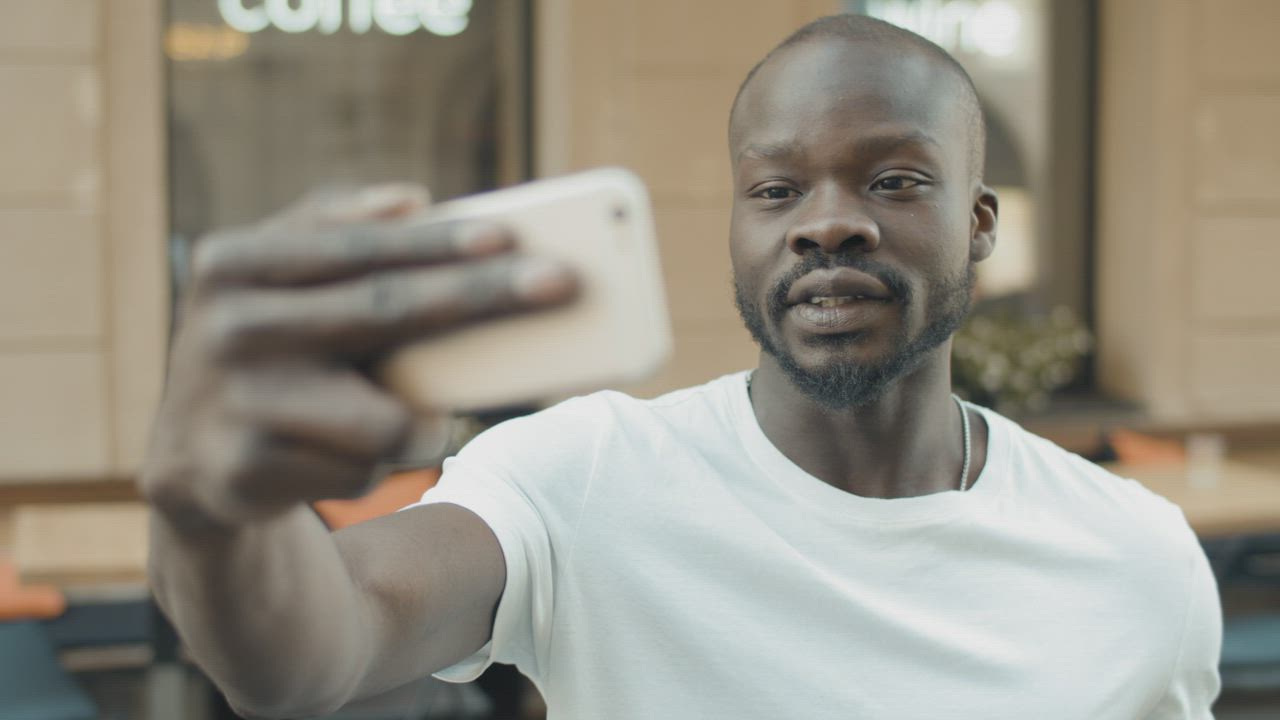 Man gets emotional on mobile video call - Free Stock Video