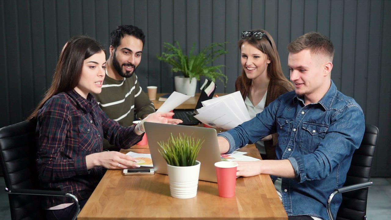 Motivated team celebrates financial success - Free Stock Video