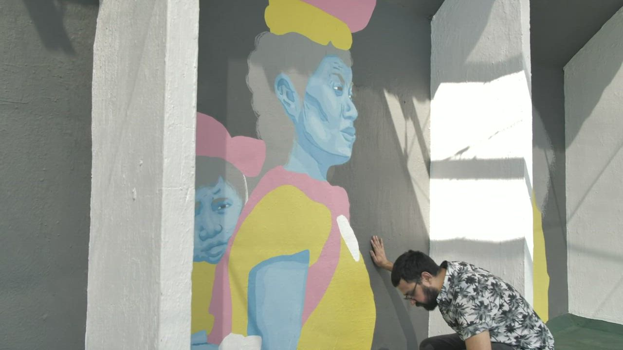 Man painting a mural - Free Stock Video