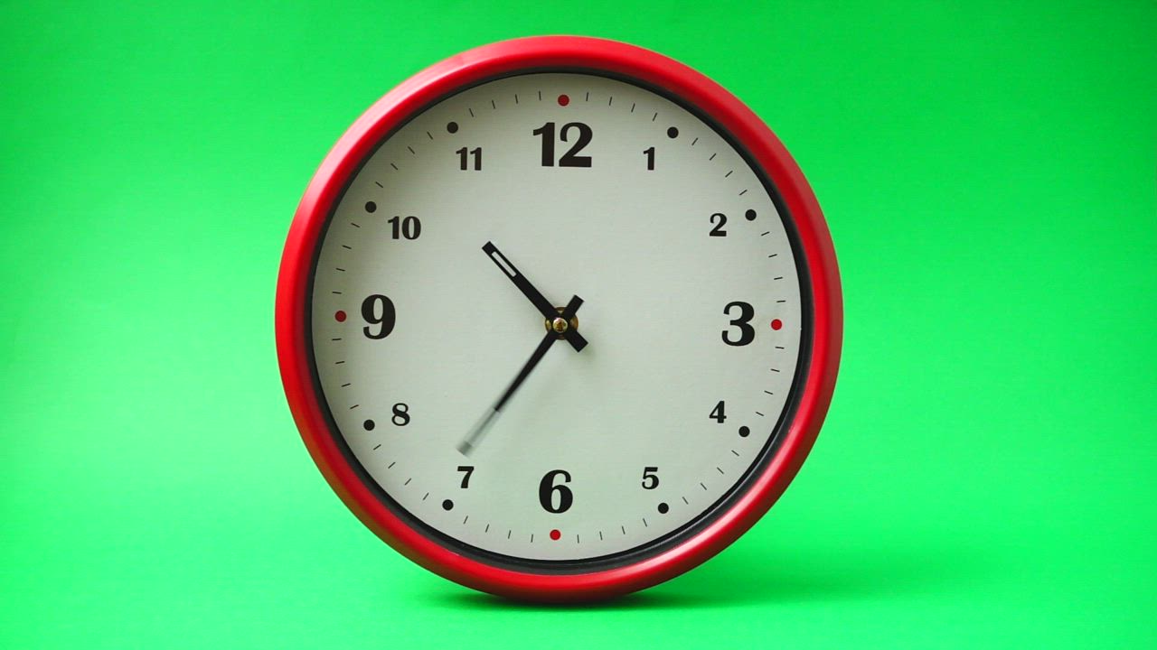 Clock moving fast on a chroma background - Free Stock Video
