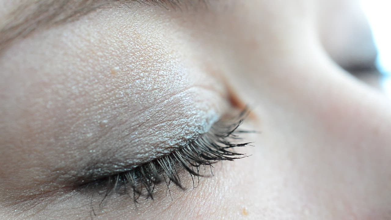 Person opening and closing eyes, macro close up - Free Stock Video