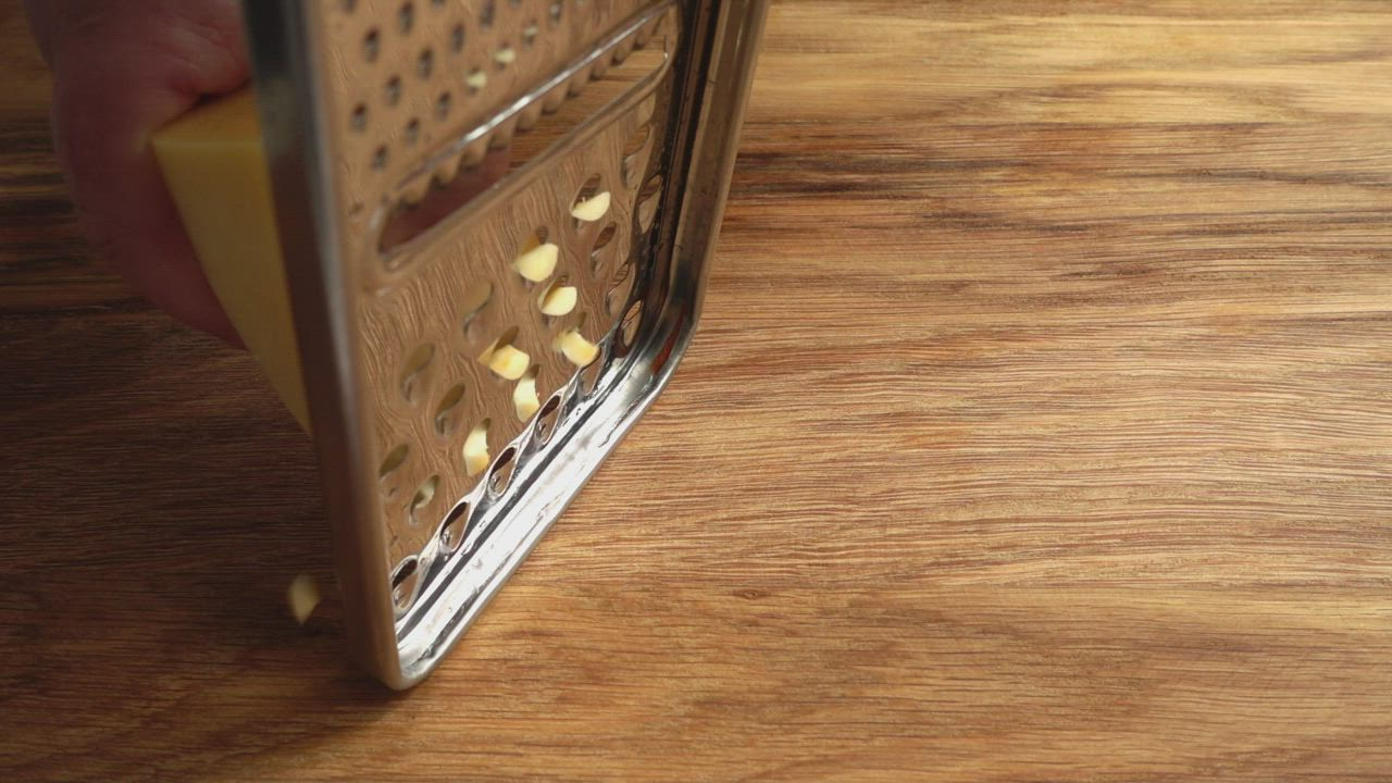Grating cheese - Free Stock Video