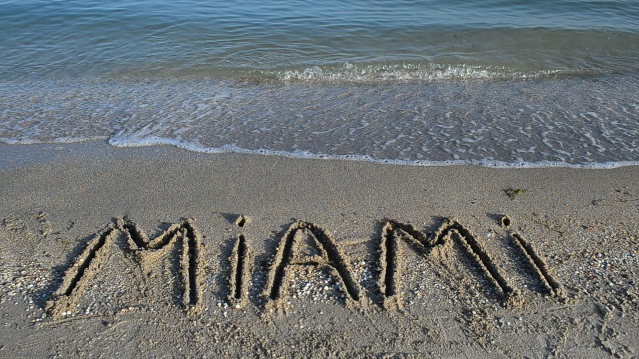 "Miami" written in the seashore sand - Free Stock Video